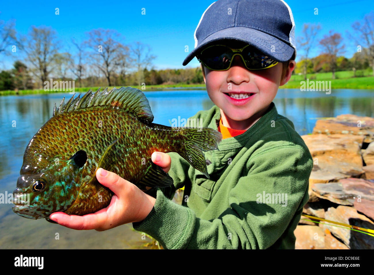 Young boy fishing in a Pennsylvania pond Stock Photo - Alamy
