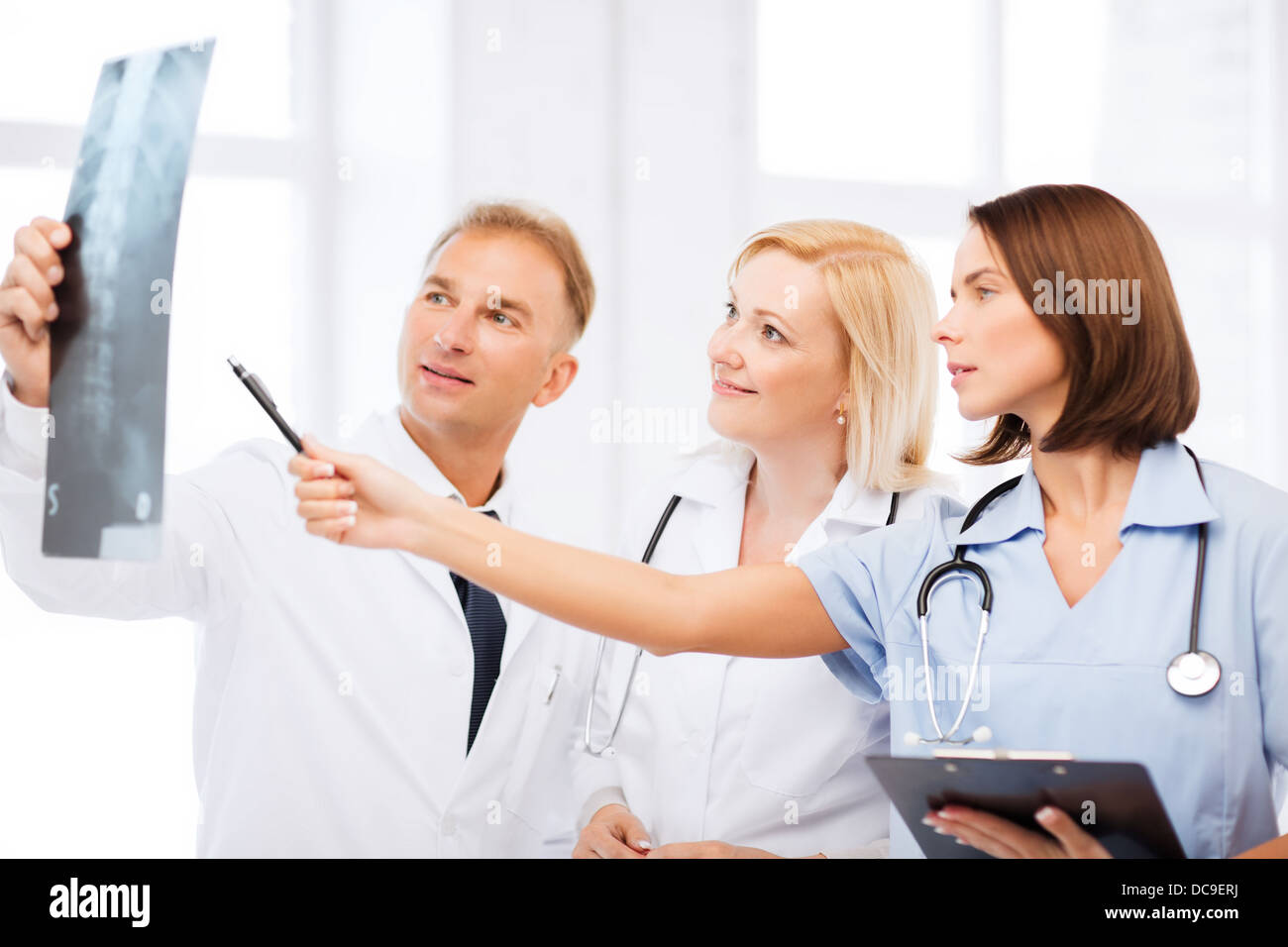 doctors looking at x-ray Stock Photo - Alamy