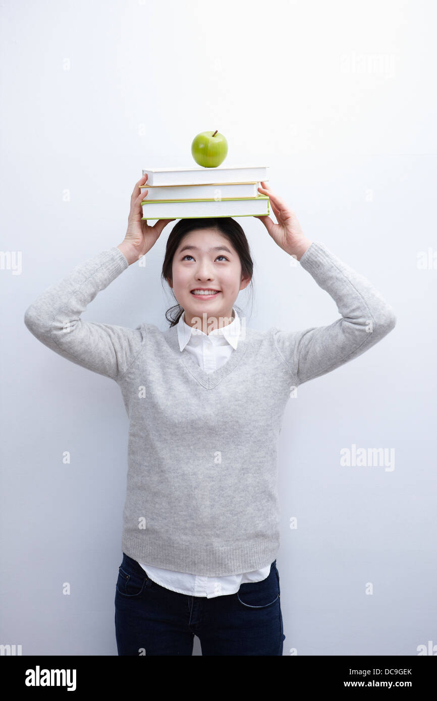 Human head with books hi-res stock photography and images - Alamy