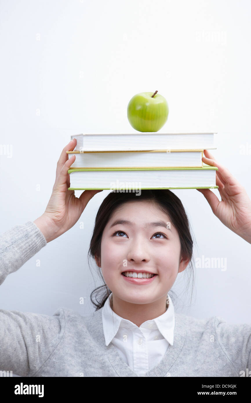 Human head with books hi-res stock photography and images - Alamy
