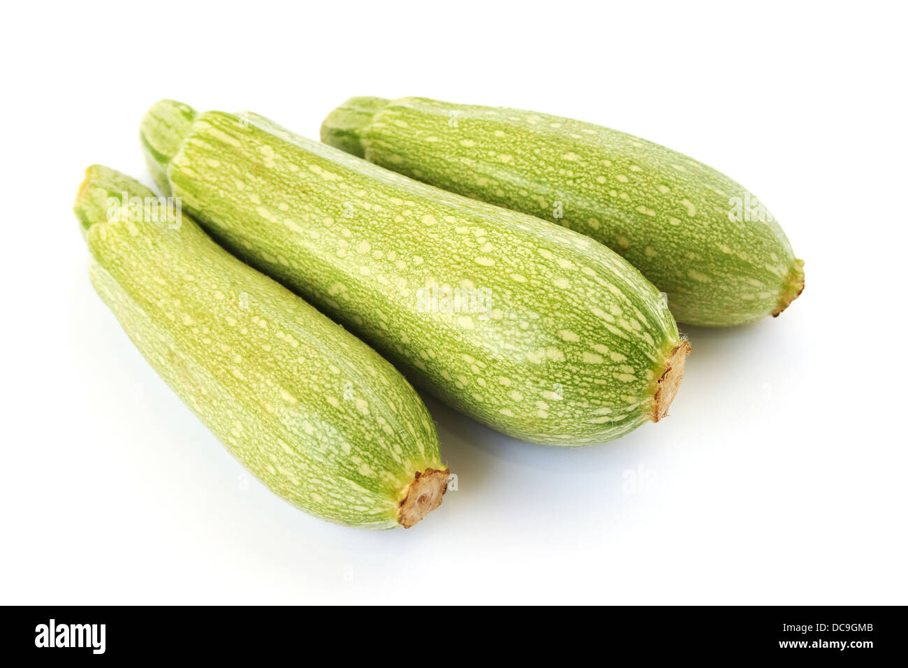 Fresh zucchini isolated on white background Stock Photo - Alamy