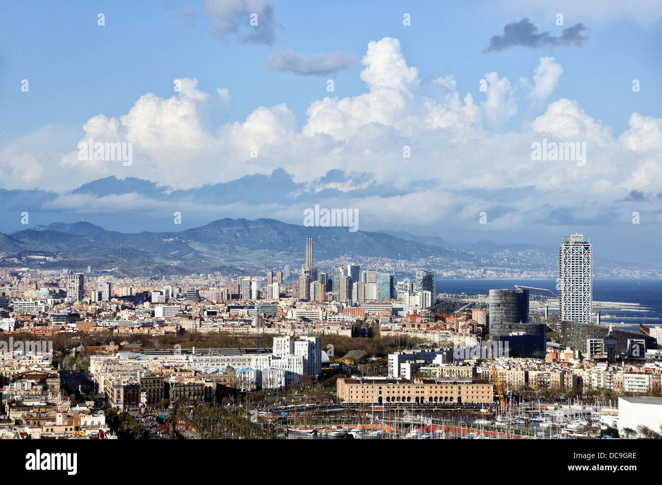 Aerial view of Barcelona from Mountain Montjuic with Clouds Stock Photo ...