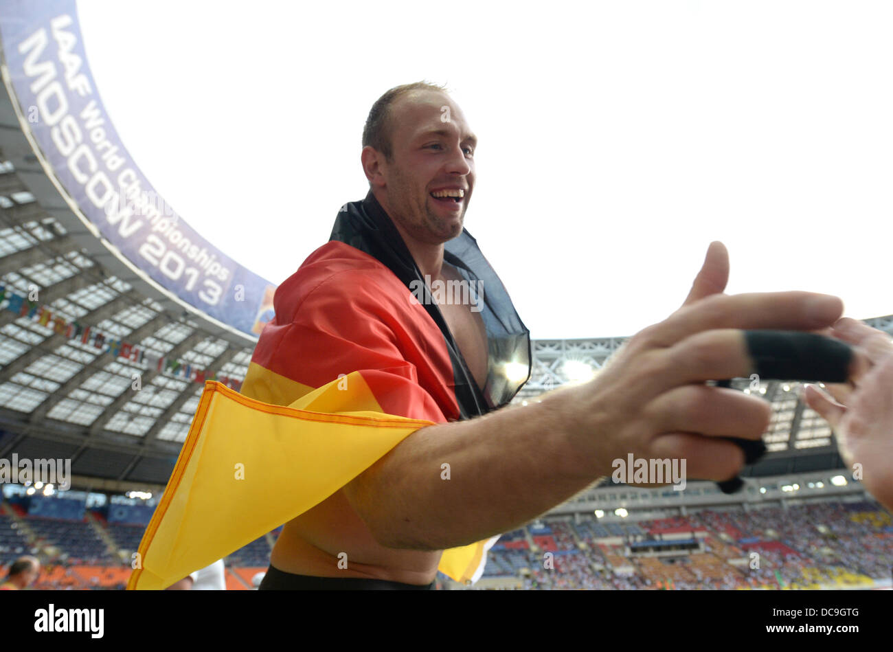 Moscow, Russia. 13th Aug, 2013. Robert Harting celebrates after winning ...