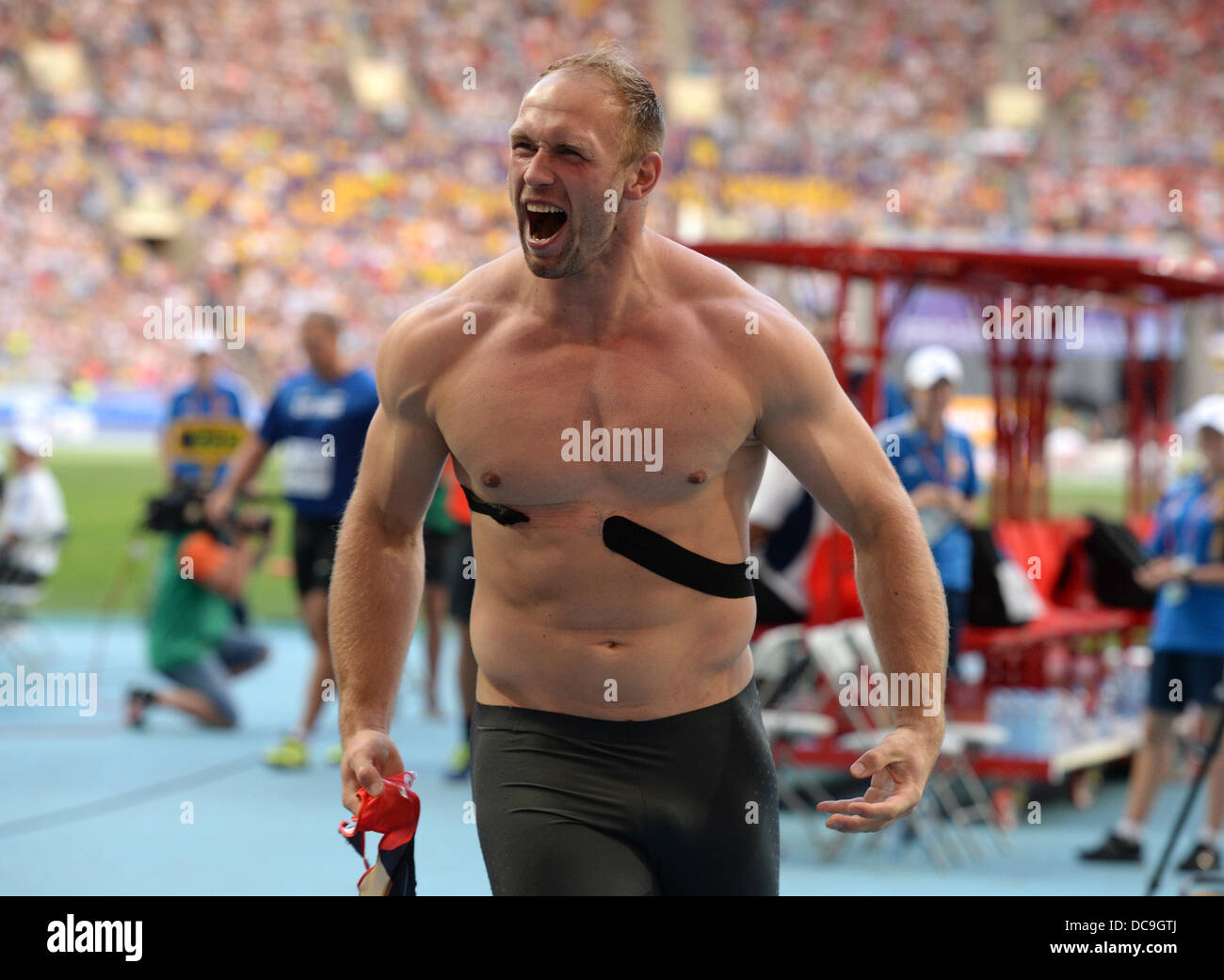 Moscow, Russia. 13th Aug, 2013. Robert Harting celebrates after winning ...
