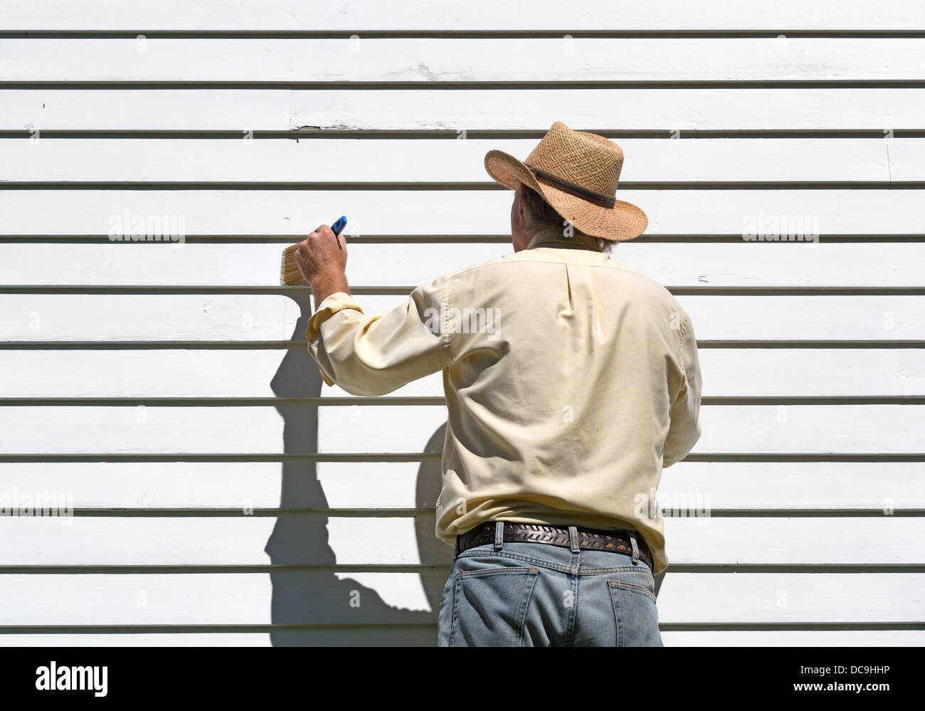 White paint spreading in yellow hi-res stock photography and images - Alamy