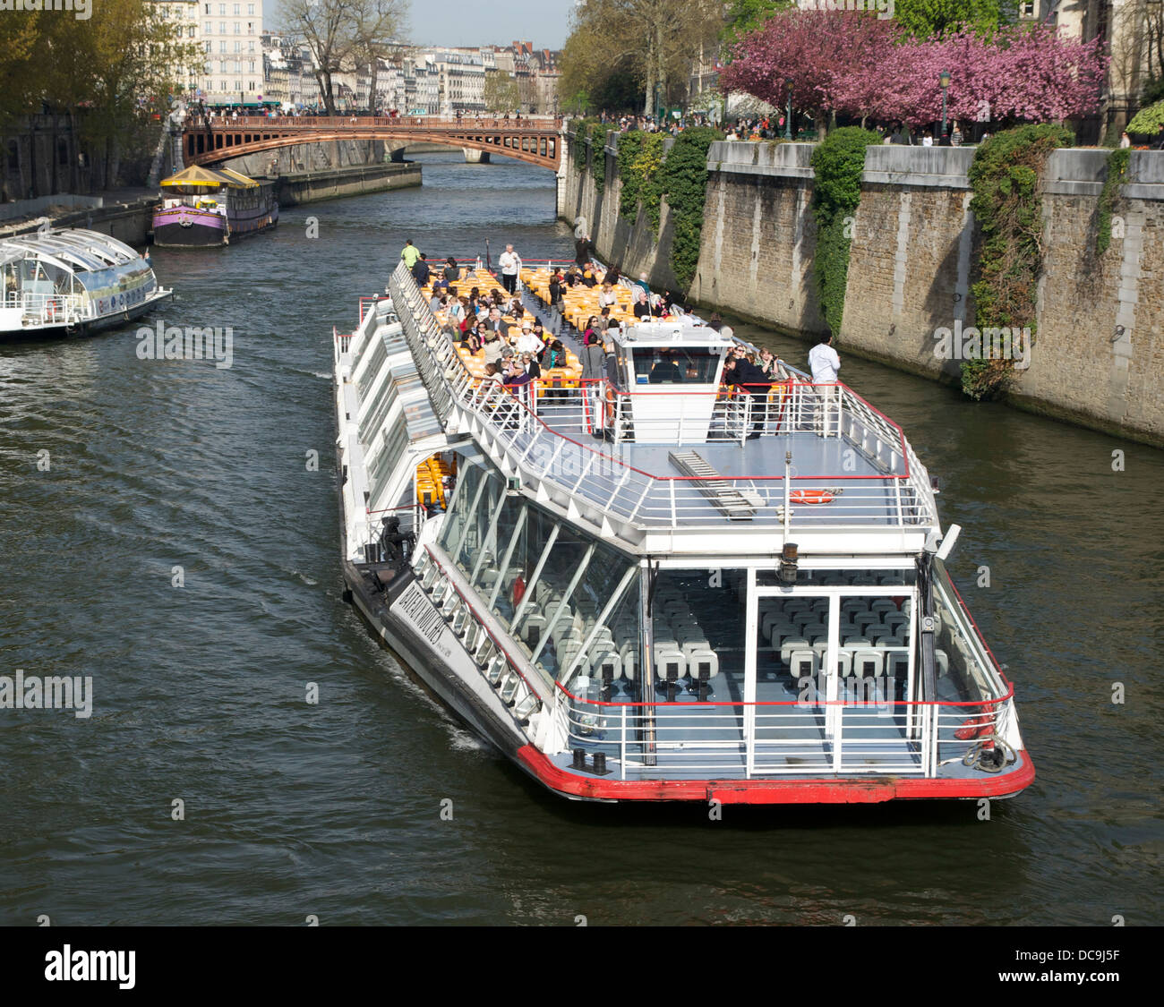 Bateaux-Mouches" on Seine River in Paris, near Notre-Dame Stock Photo ...
