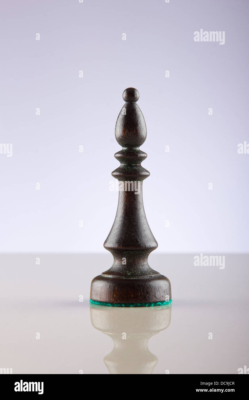 Single wooden black chess bishop Stock Photo - Alamy