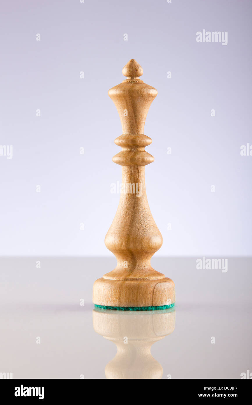 Single wooden chess queen Stock Photo - Alamy
