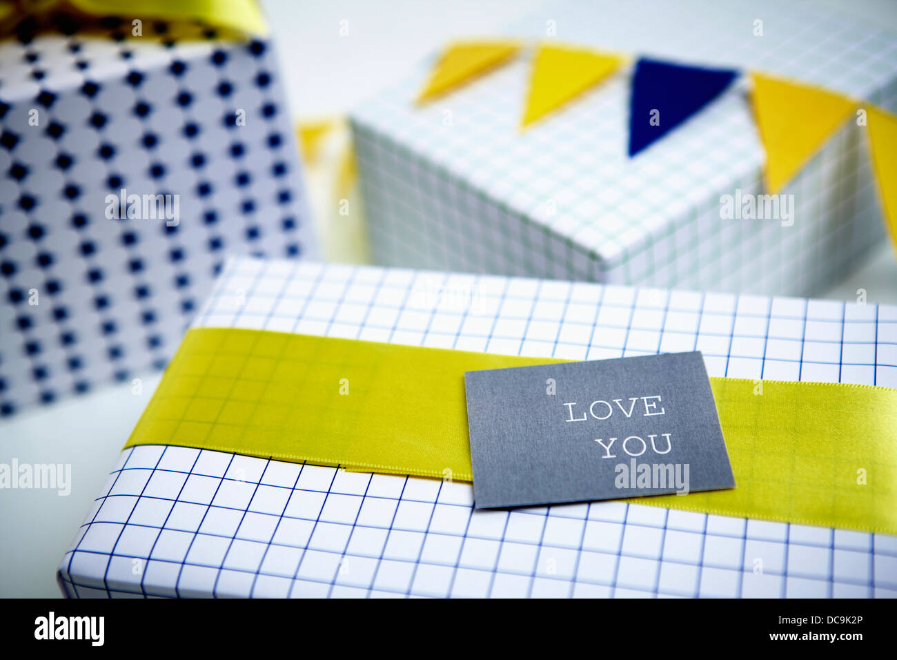 gift boxes in yellow colour Stock Photo - Alamy