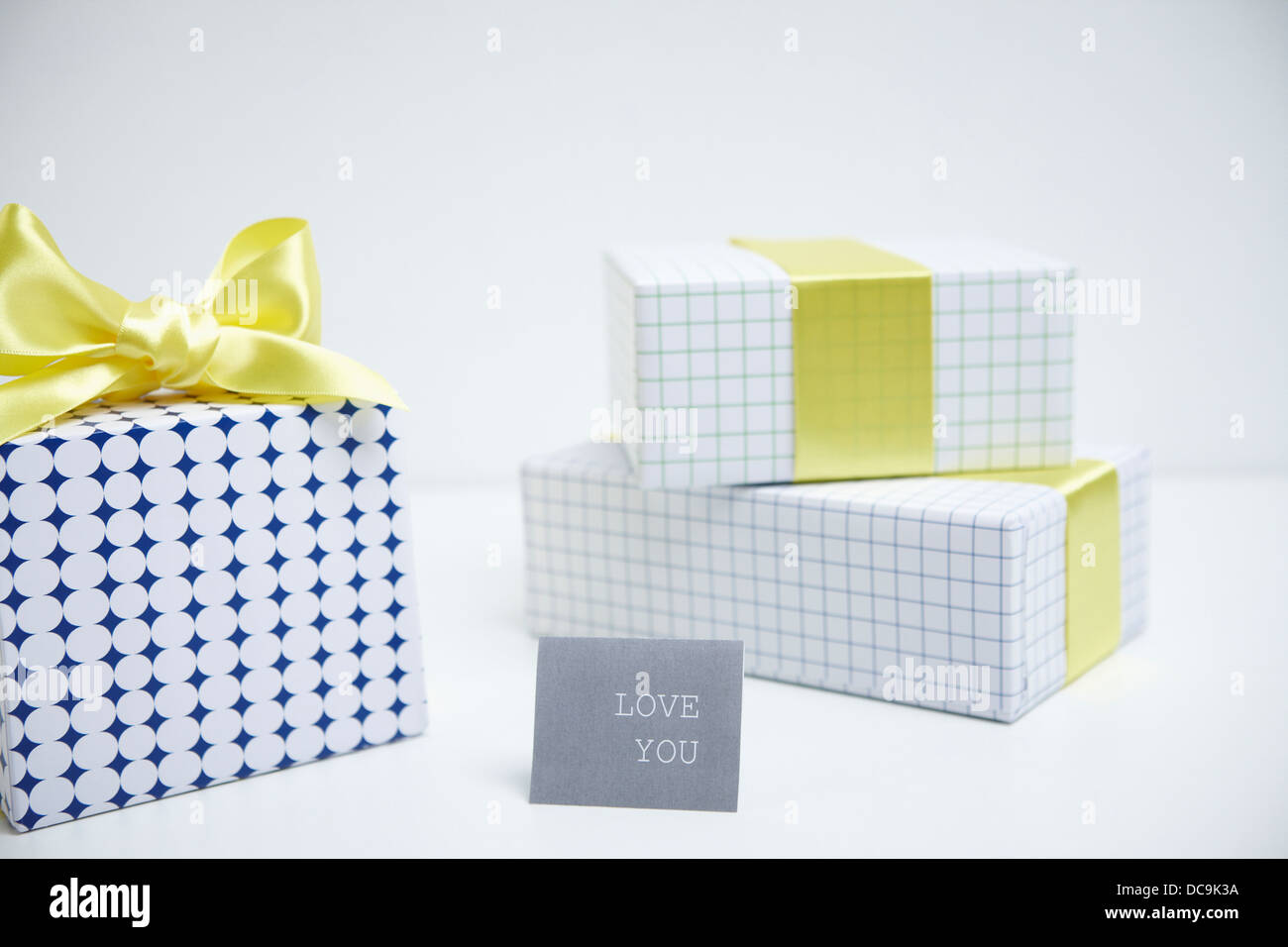 gift boxes in yellow colour Stock Photo - Alamy