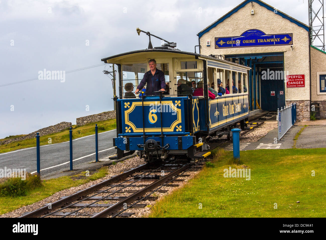 Tram number 6, tram # 6, Blue tram leaving tram station Stock Photo - Alamy