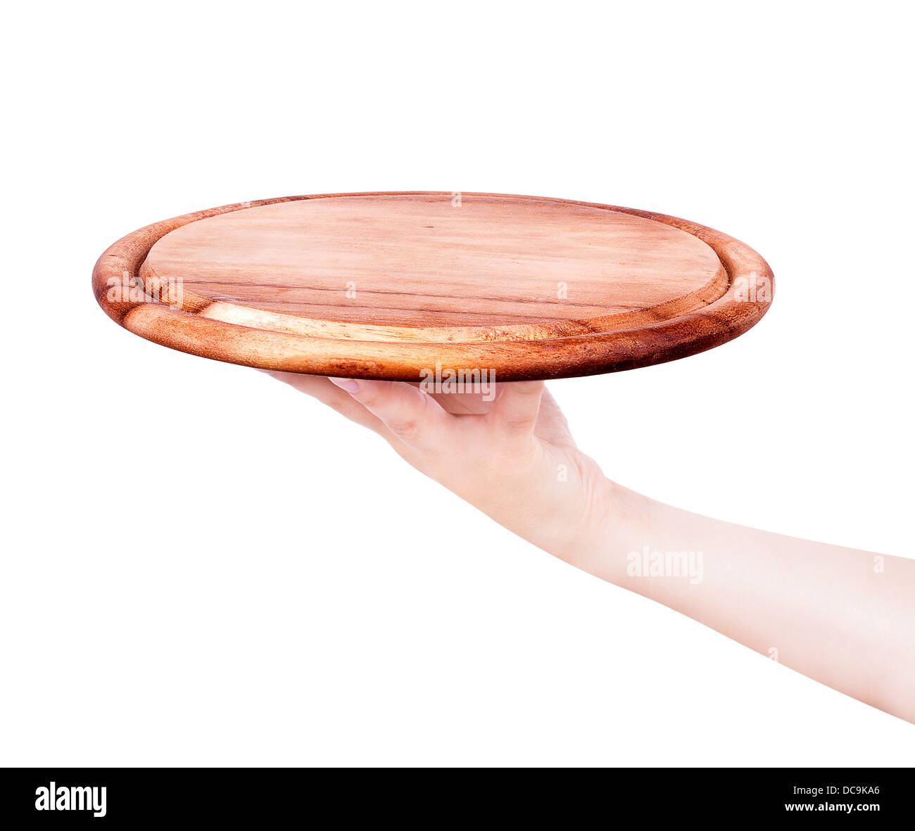 Closeup of a waiter hand holding up a silver serving tray over a white ...
