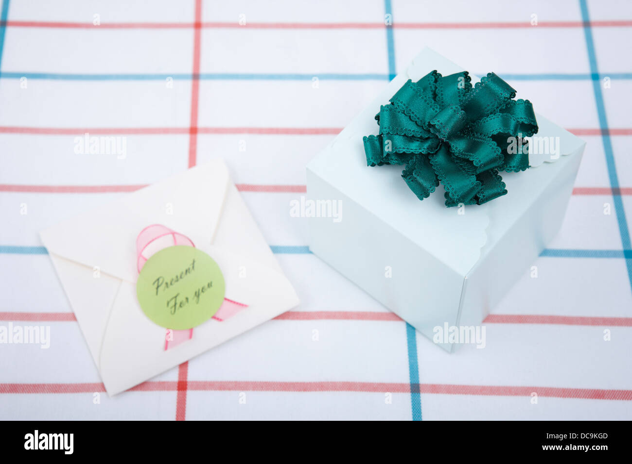 gift box with green ribbon Stock Photo - Alamy
