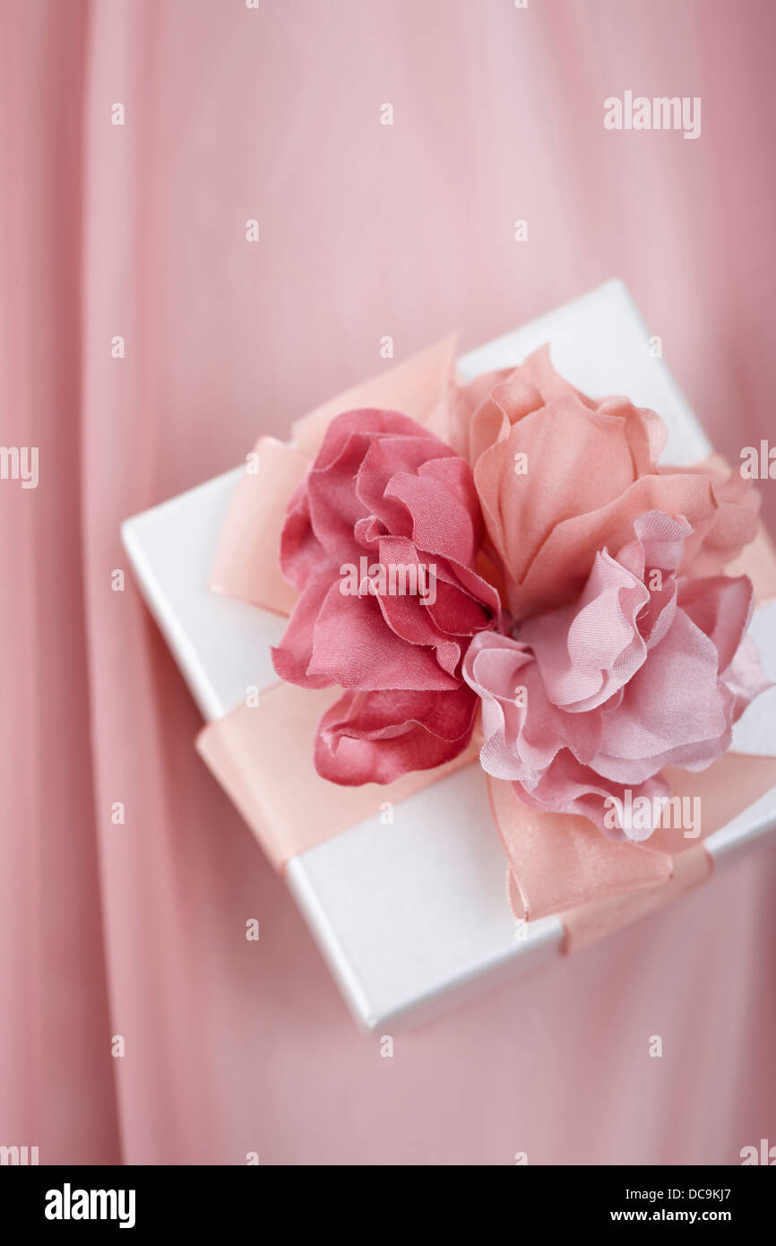 a gift with pink flower Stock Photo - Alamy