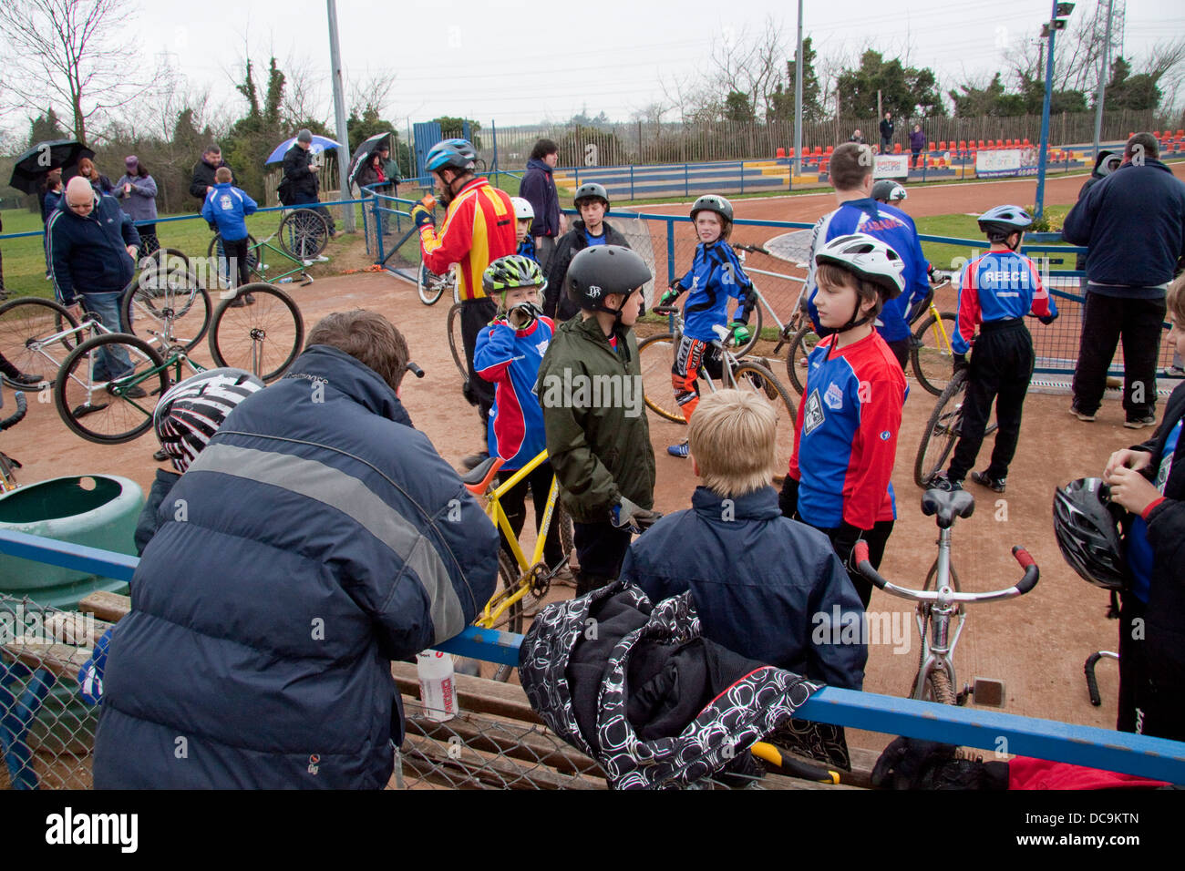 In paddock at a cycle speedway riders, mostly young boys, waiting for ...