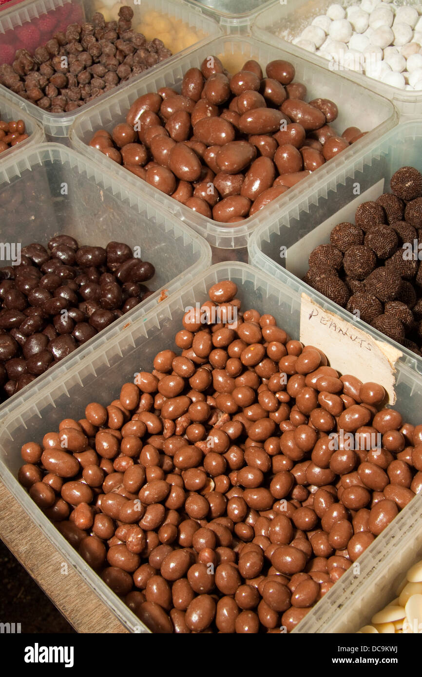 Chocolate sweets in plastic boxes on a serve yourself pic 'n mix stall ...