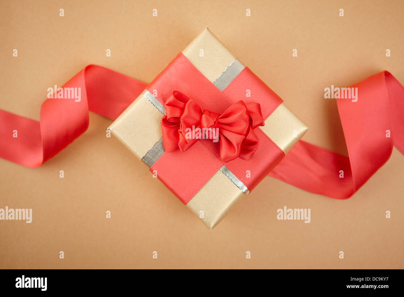 a gift box with red ribbons Stock Photo - Alamy