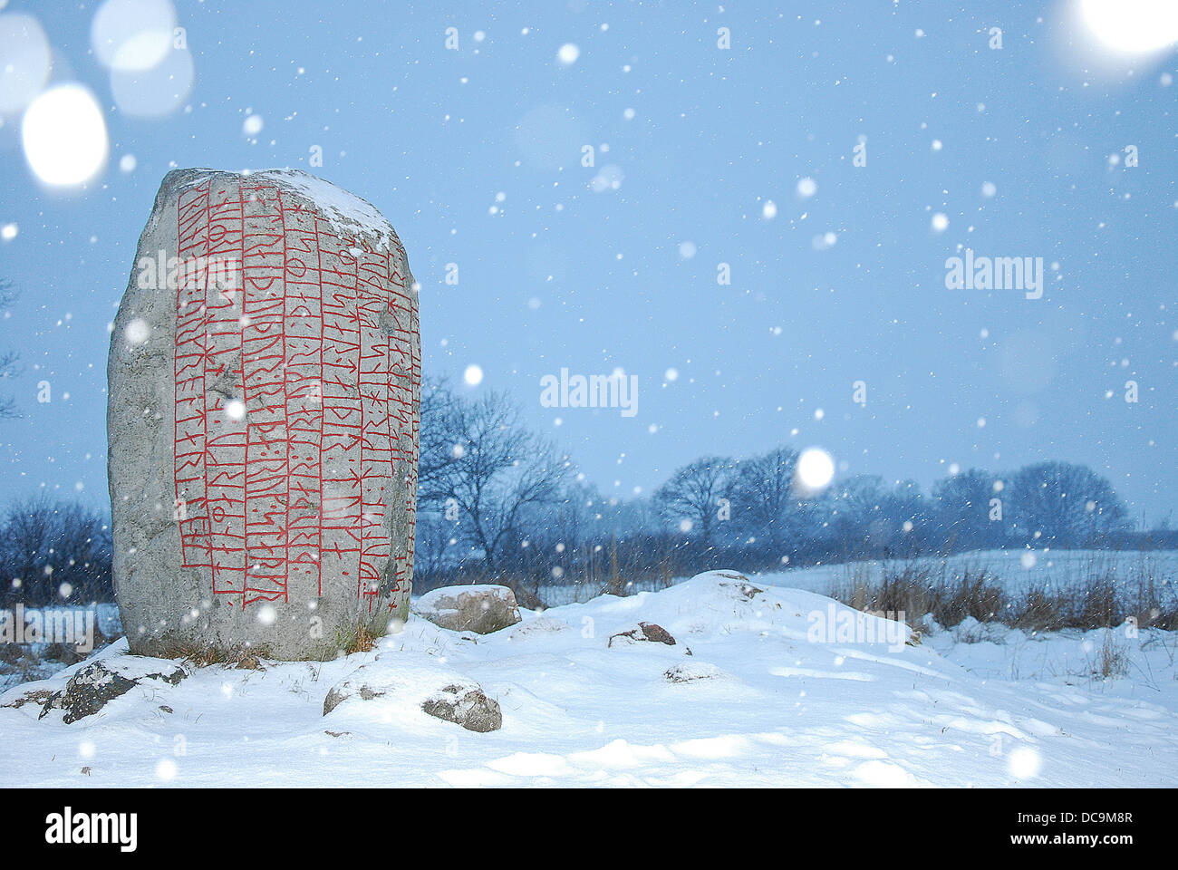 Runestone in snowfall Stock Photo - Alamy