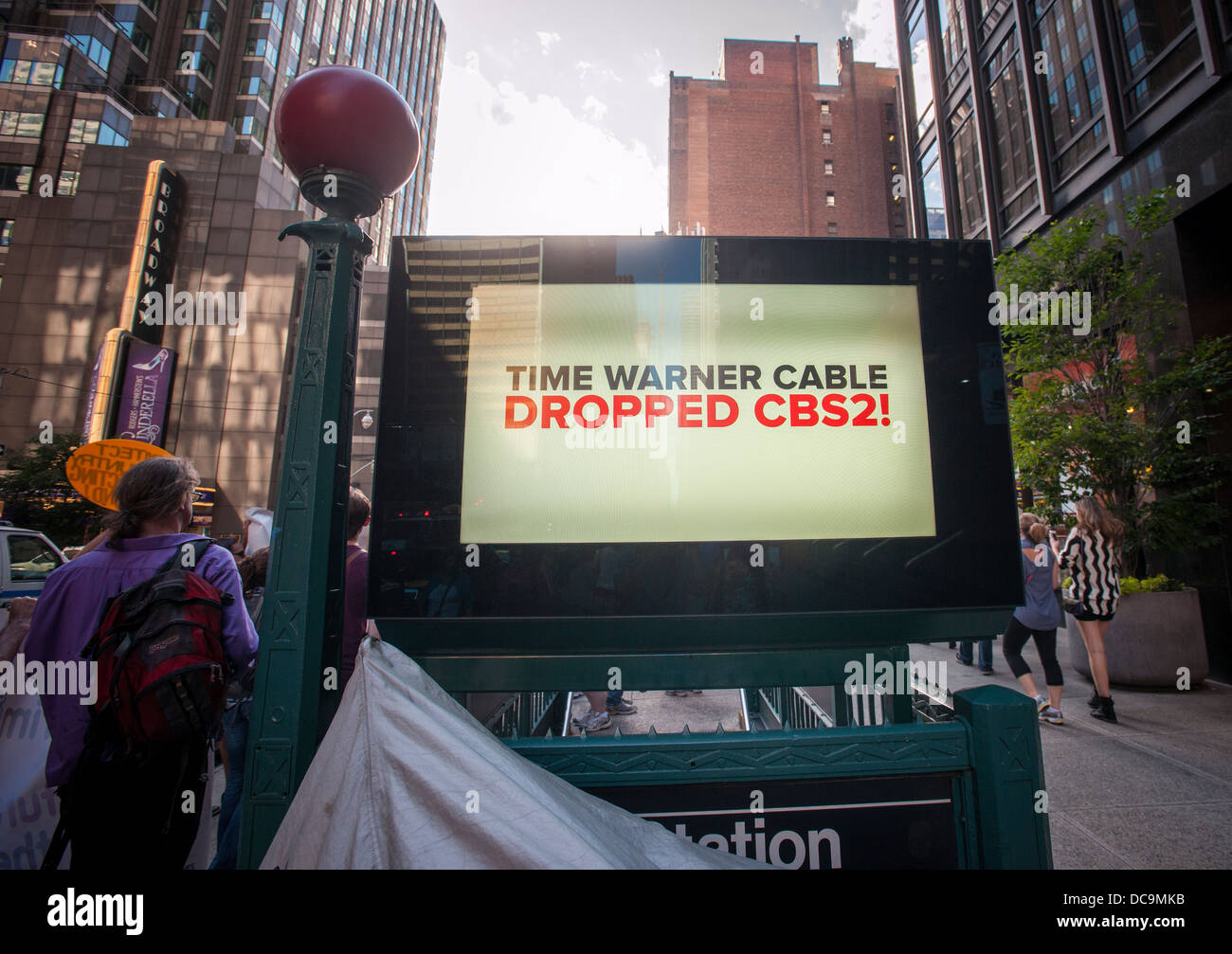 An electronic billboard on a subway entrance in New York urges ...