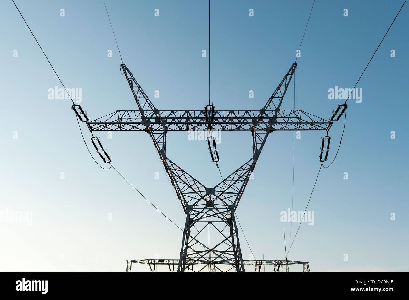 High voltage line pylon steel structure against sky Stock Photo - Alamy