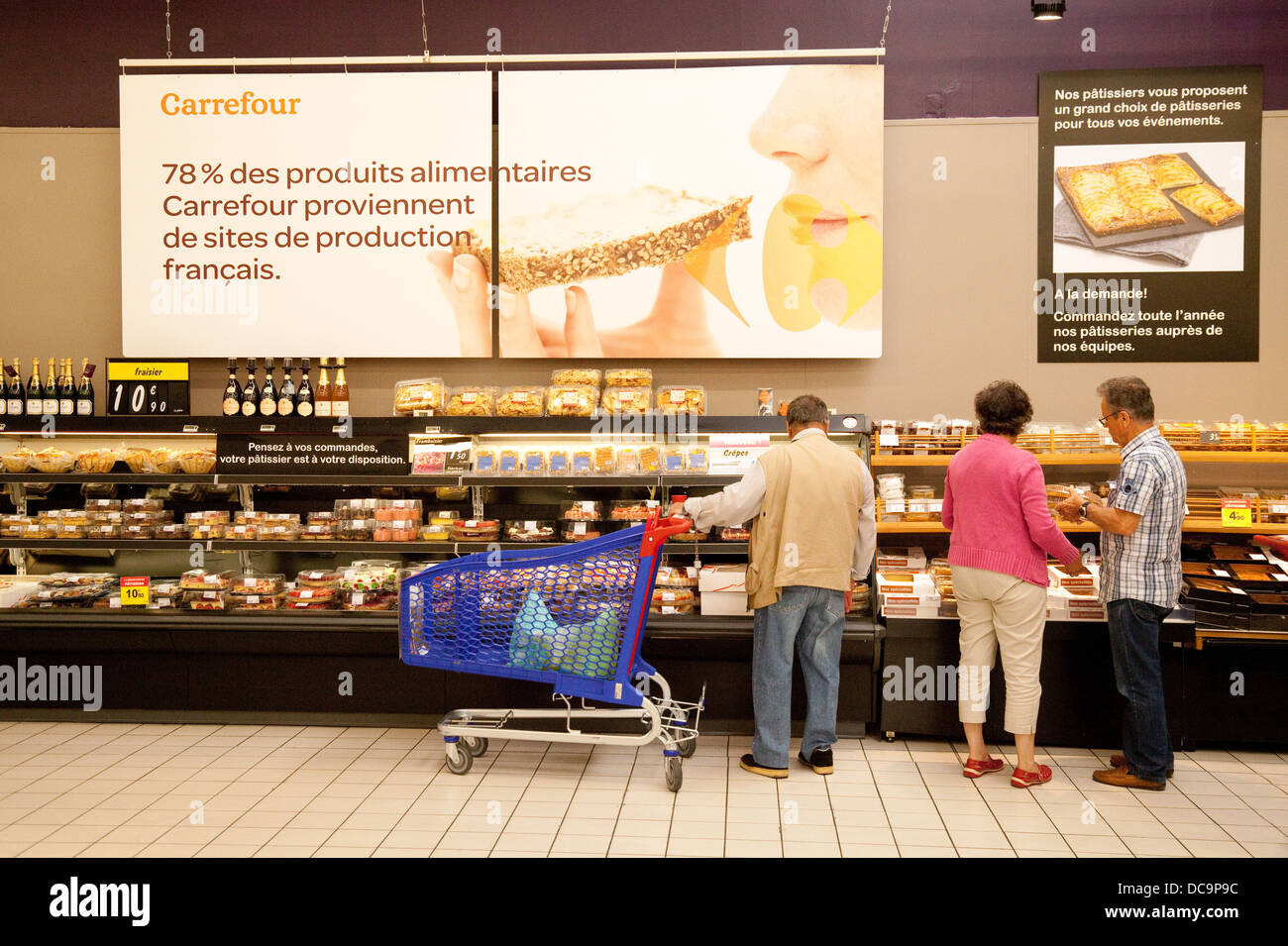 Carrefour supermarket interior, people shopping, France Europe Stock ...