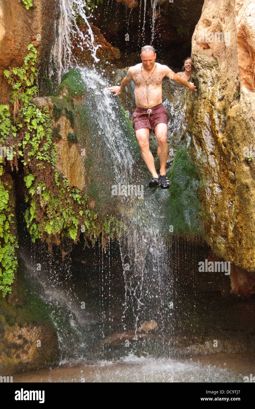 Grand Canyon National Park, Arizona, USA. Rafter jumping off falls at ...