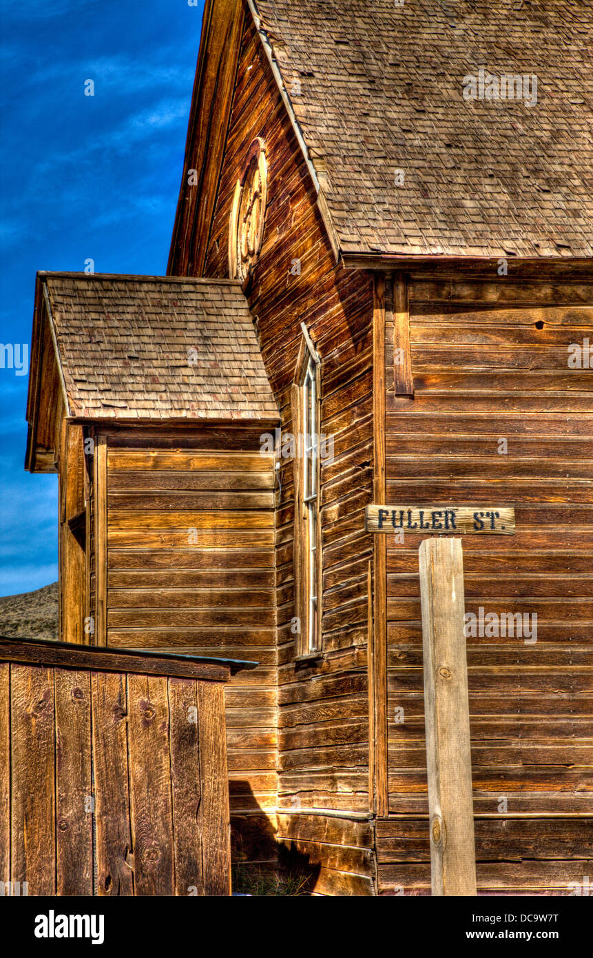 USA, California, Bodie State Historic Park. Side view of abandoned Methodist Church in ghost ...