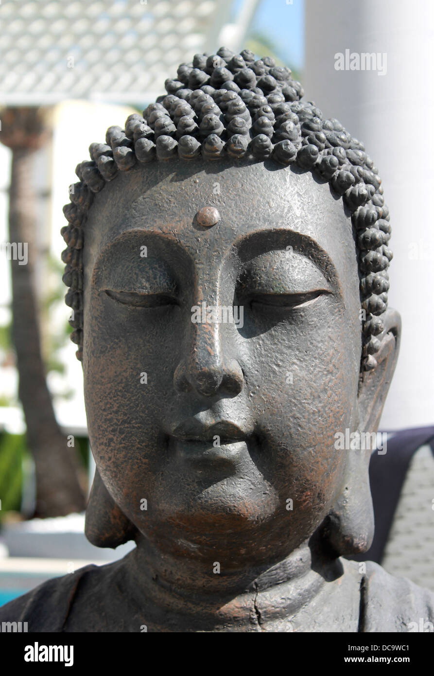 Face of Buddha on statue outdoors Stock Photo - Alamy