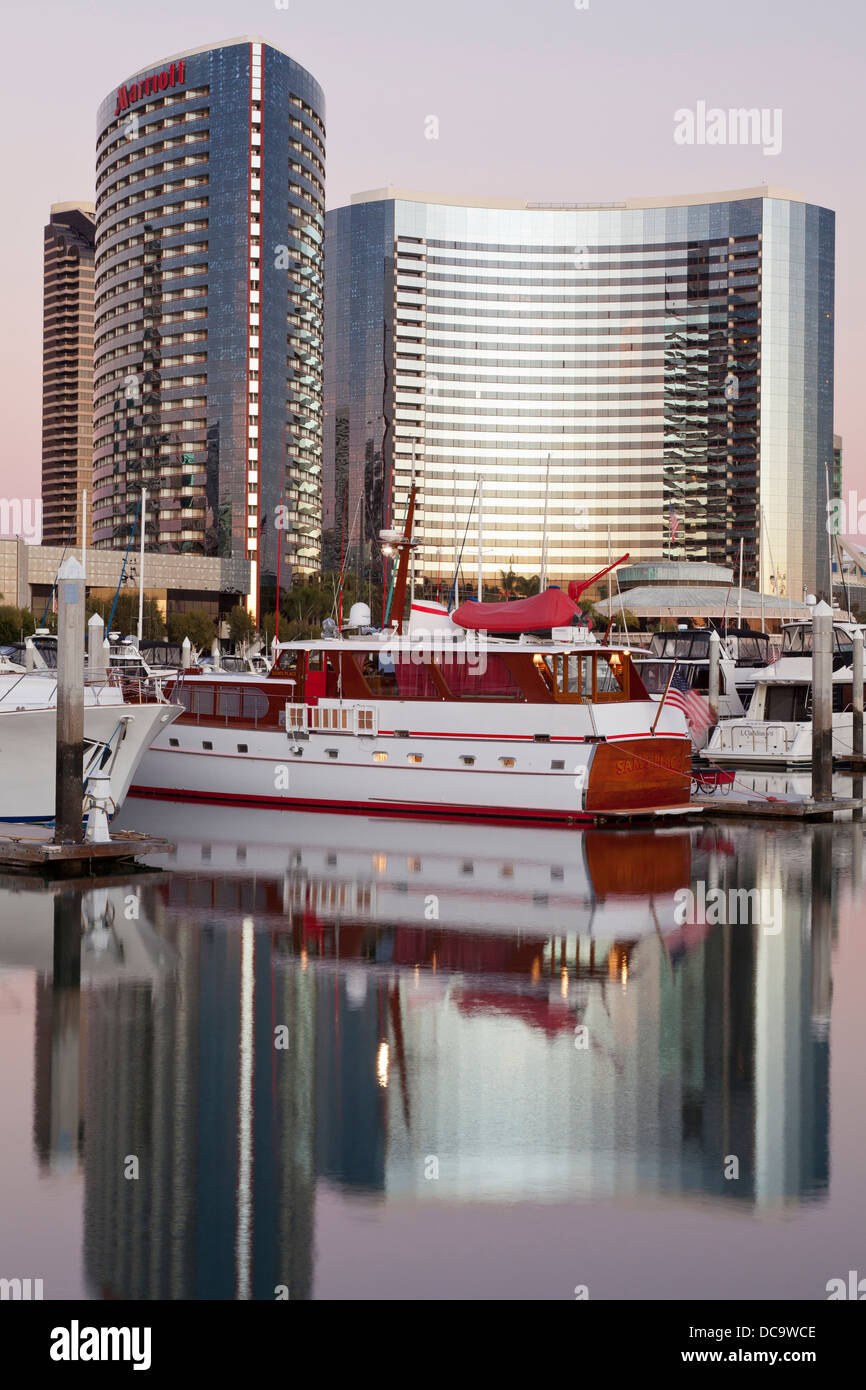 USA, California, San Diego. View of moored boats in harbor and Marriott ...