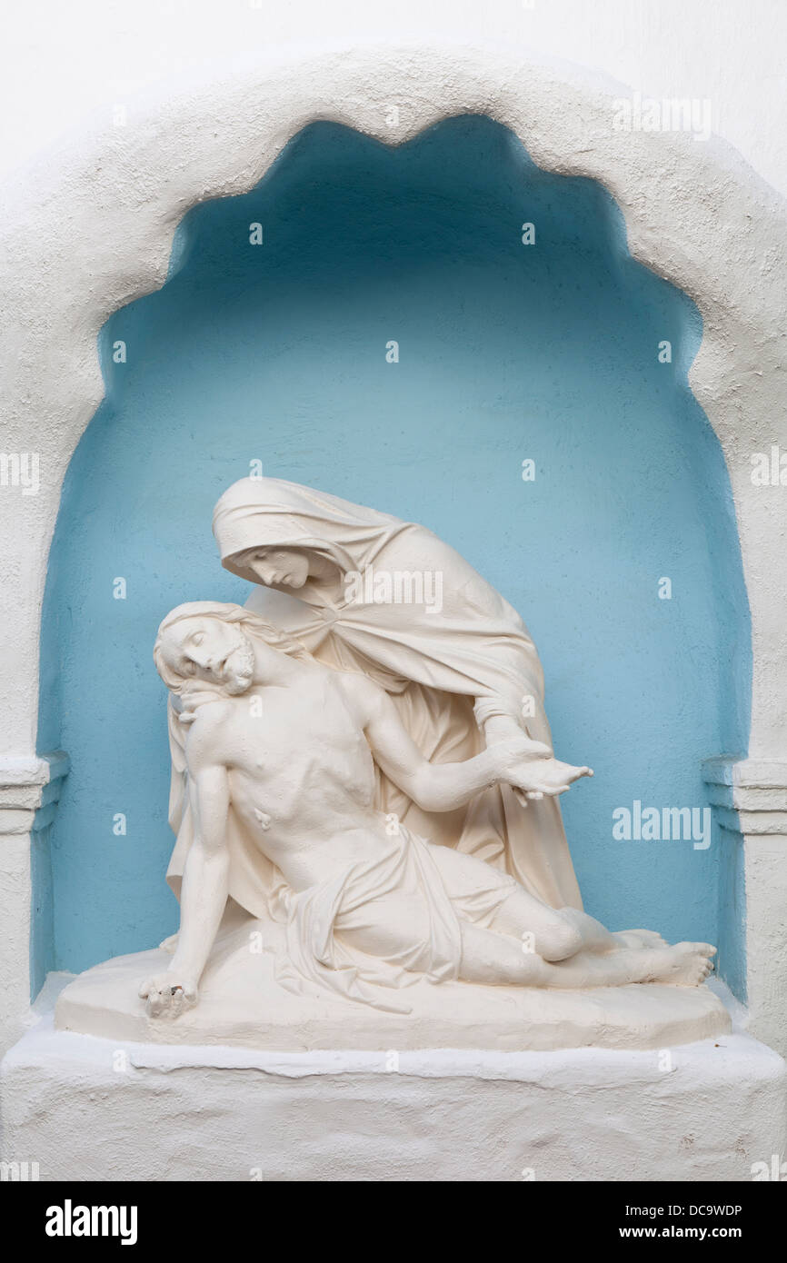 USA, California, San Diego. Statues inside alcove at Mission San Diego ...