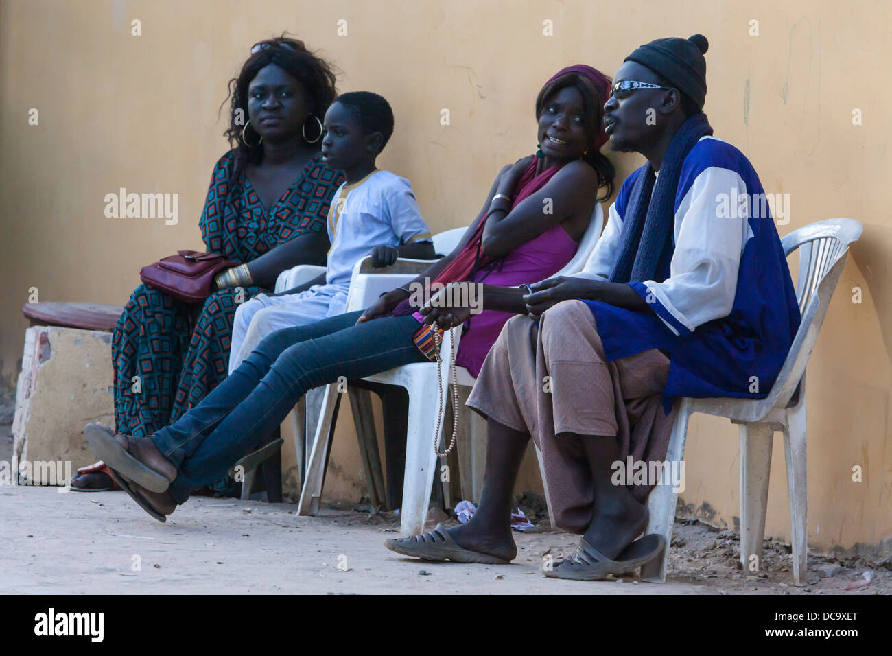 People Talking, Goree, Senegal. The man is holding a Muslim rosary ...