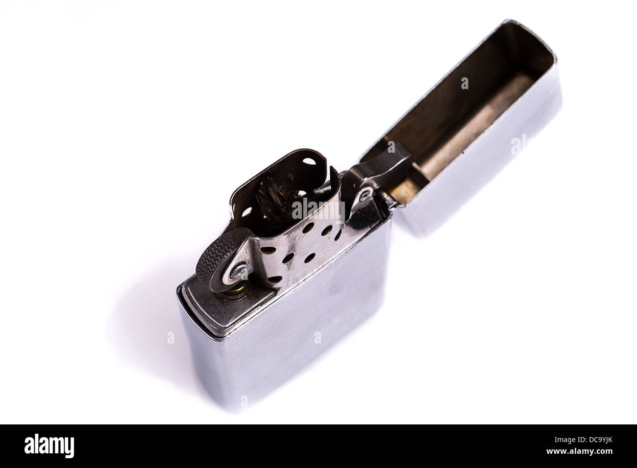 Silver metal zippo lighter isolated on white Stock Photo - Alamy