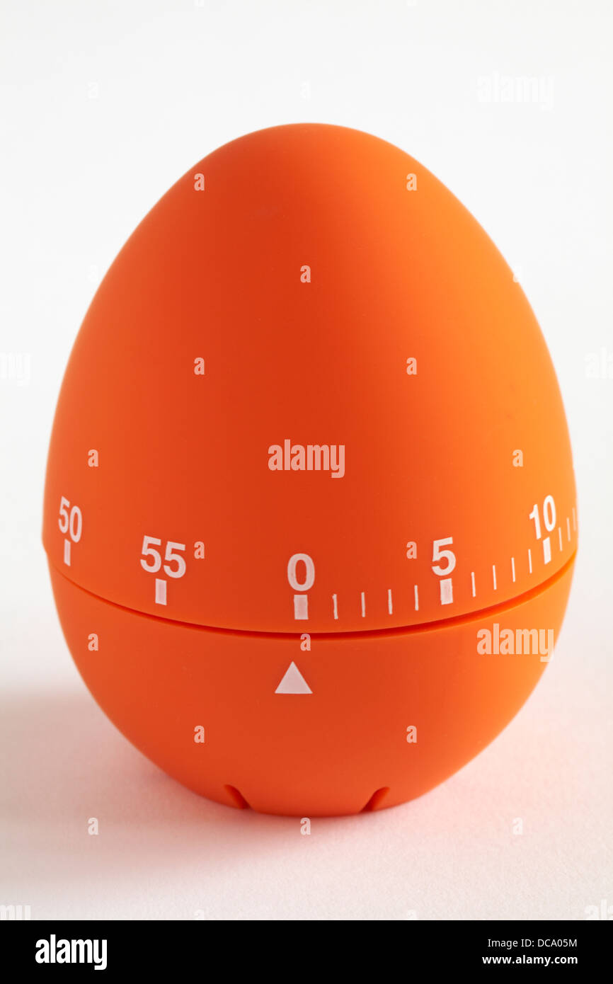 egg shaped orange coloured timer egg timer showing time up isolated on ...
