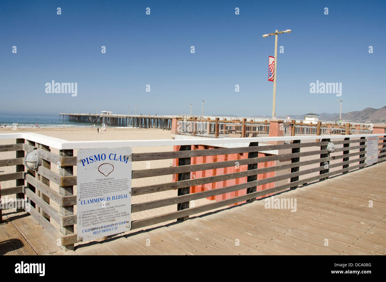 USA, California, Pacific Coast, Pismo State Beach Pier. Pismo Clam sign ...