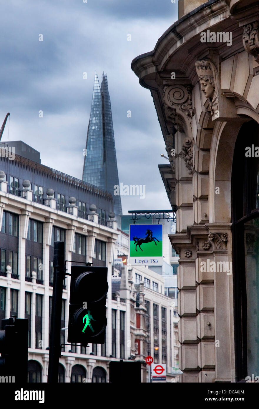 A green man signal flashes in the City of London - a go sign for the ...