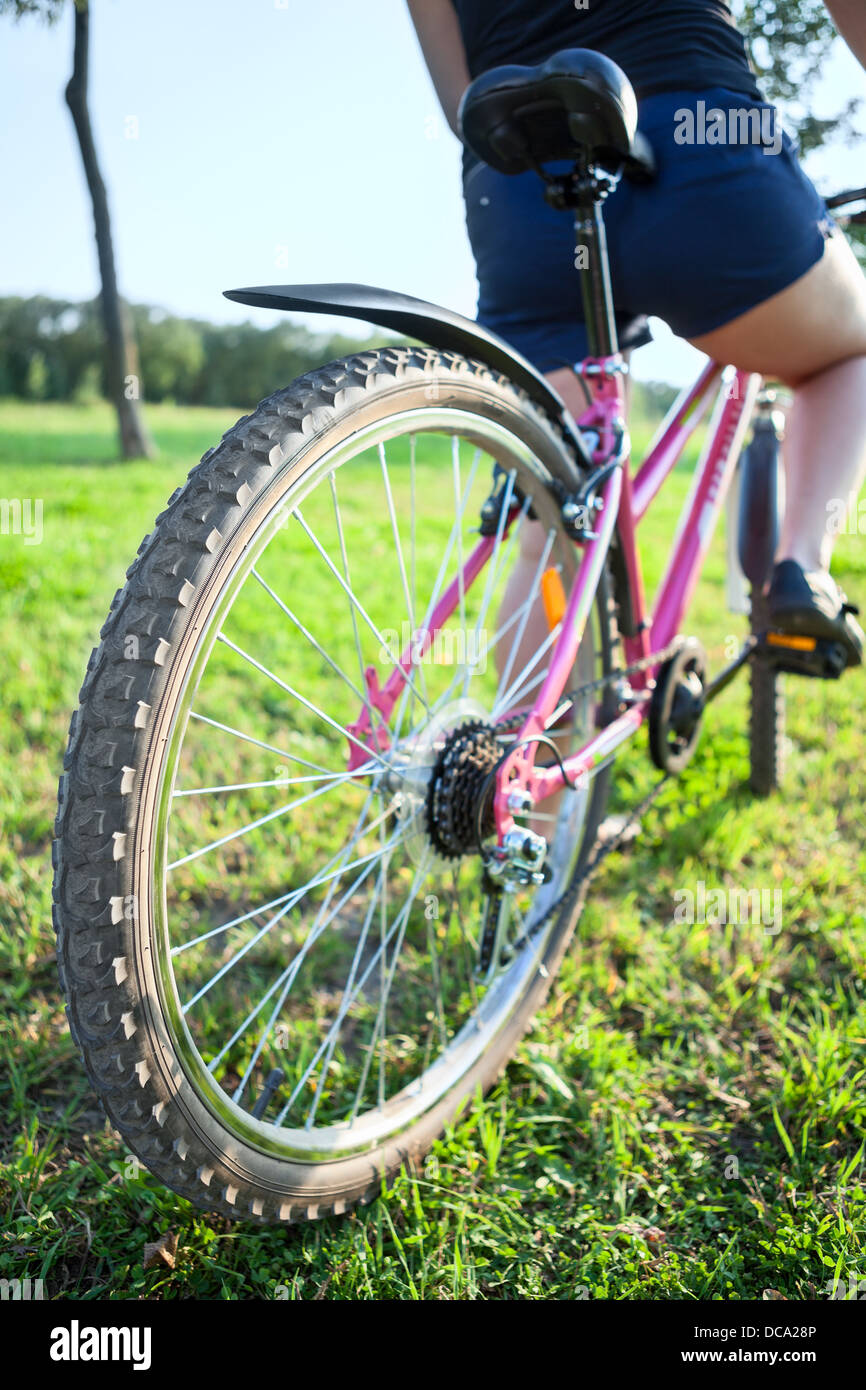 Rear wide view woman biking hi-res stock photography and images - Alamy