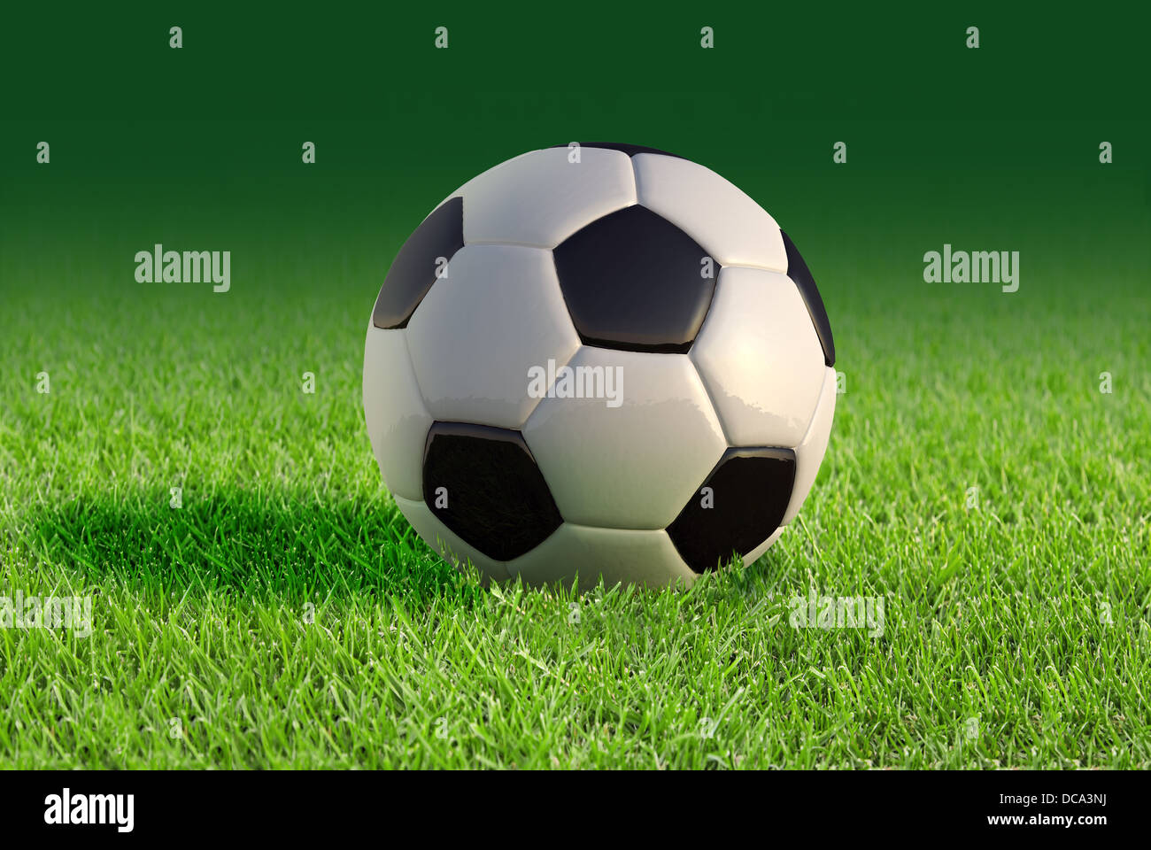 Soccer/football ball close up on grass lawn, with fading green ...