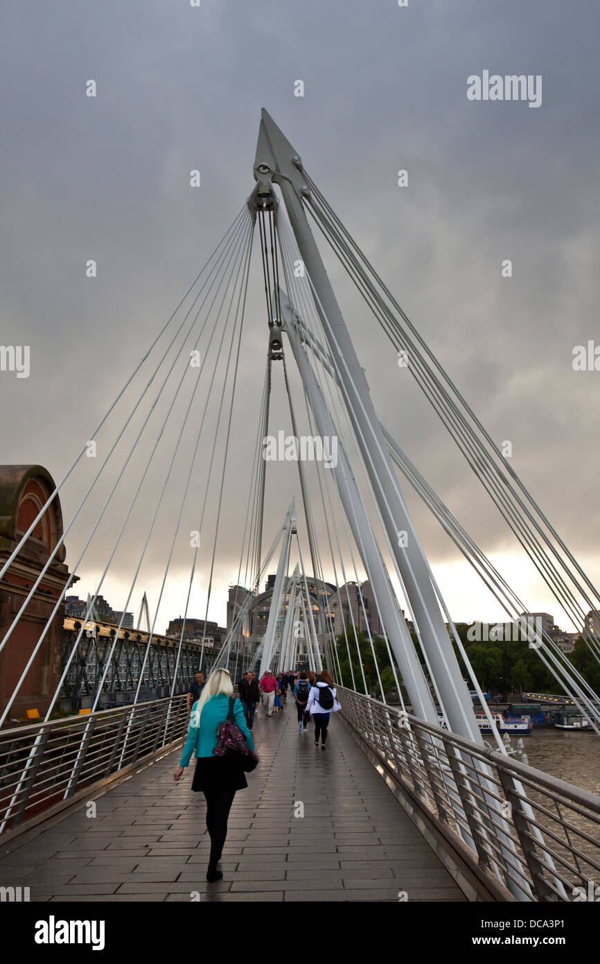 People crossing footbridge hi-res stock photography and images - Alamy