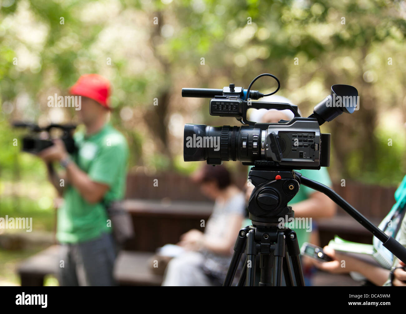 capturing event with professional video camera Stock Photo - Alamy