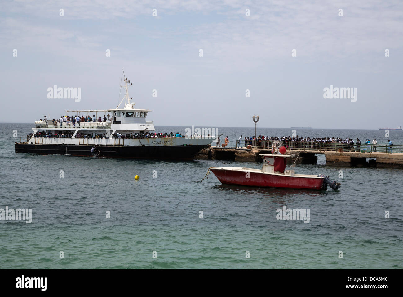 Dakar Ferry Arriving; Returning Passengers Waiting on Pier to Board ...