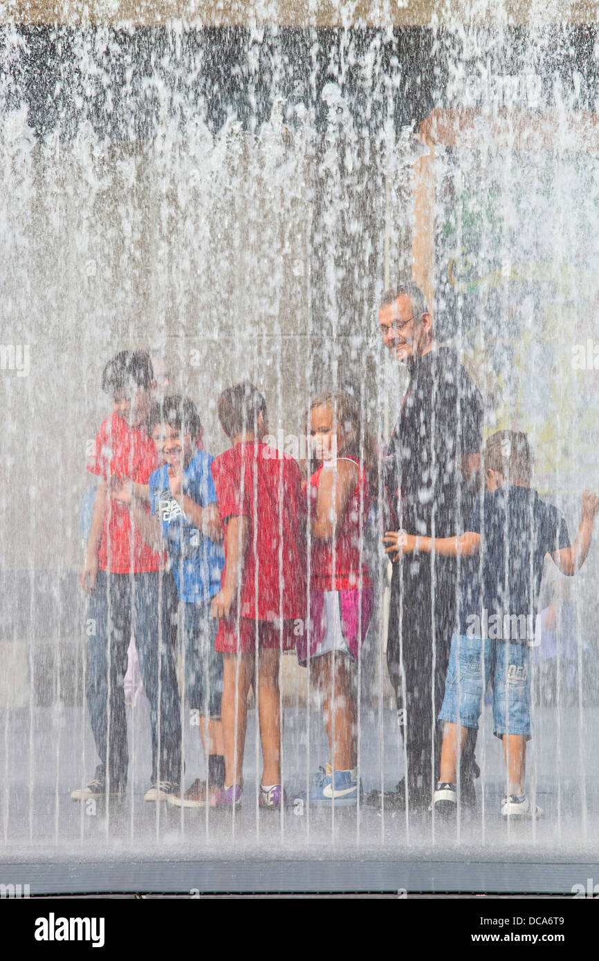 People Playing In The Appearing Rooms, Interactive Water Fountains, The ...