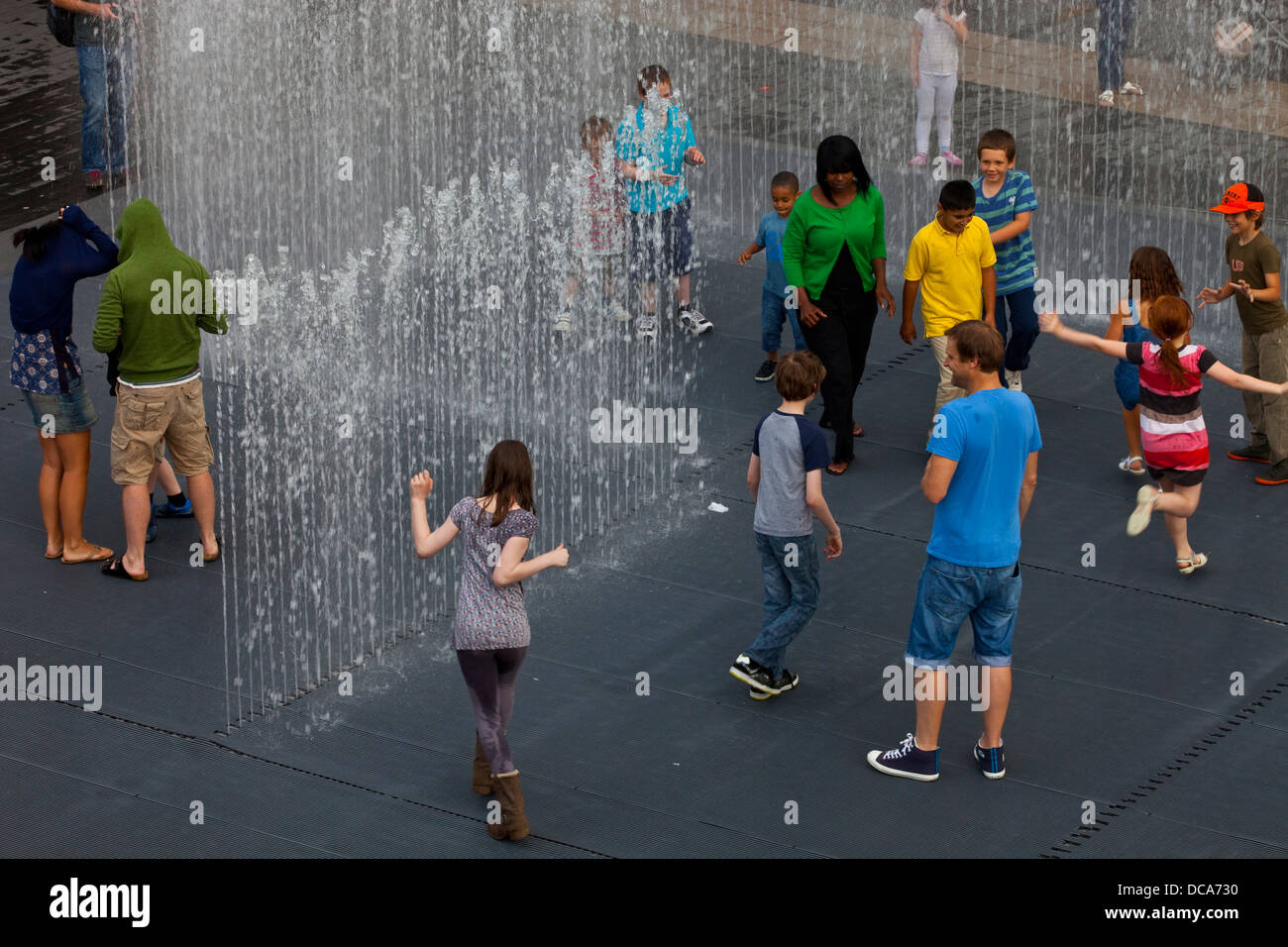 People Playing In The Appearing Rooms, Interactive Water Fountains, The ...
