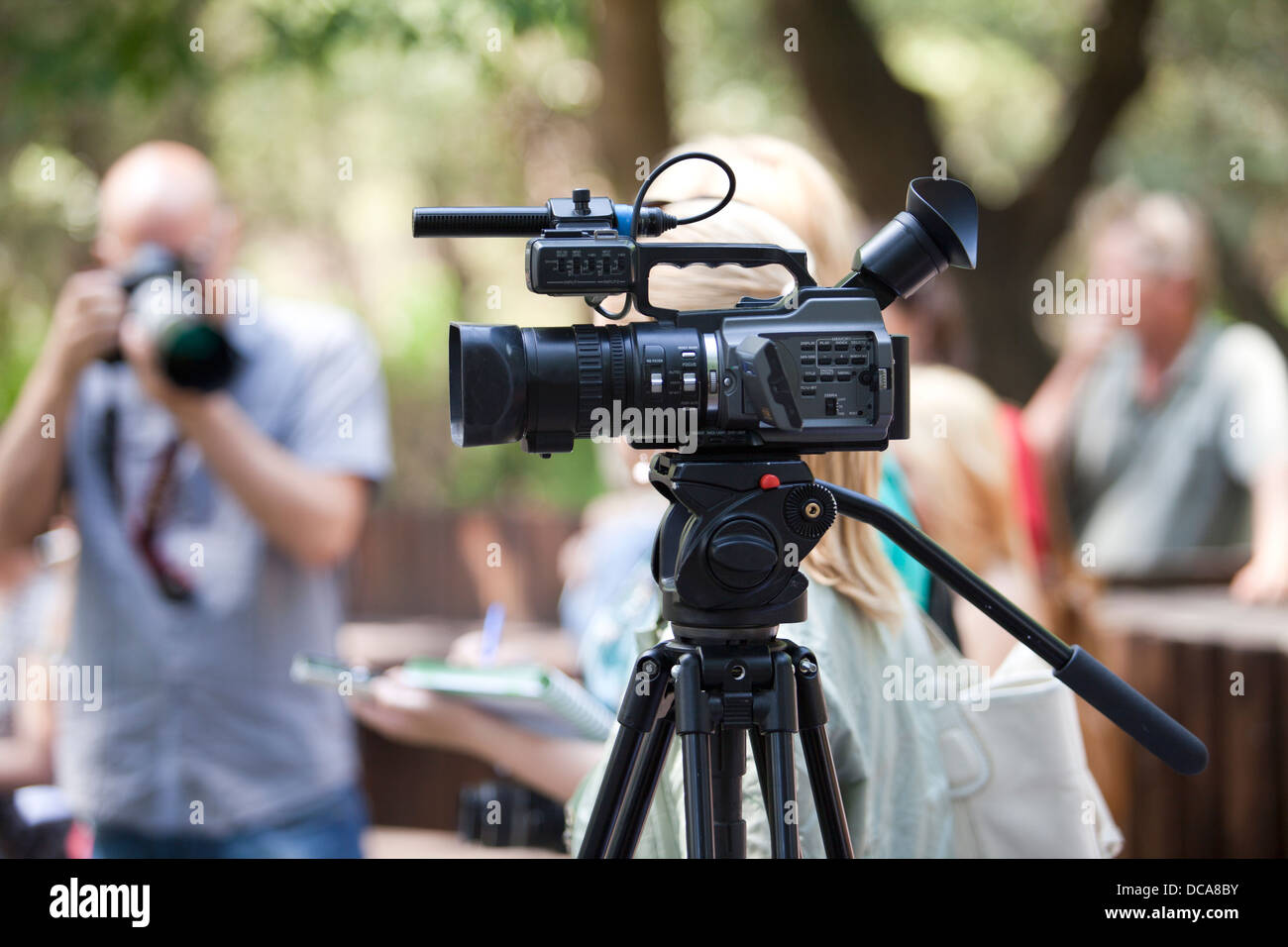 capturing event with professional video camera Stock Photo - Alamy