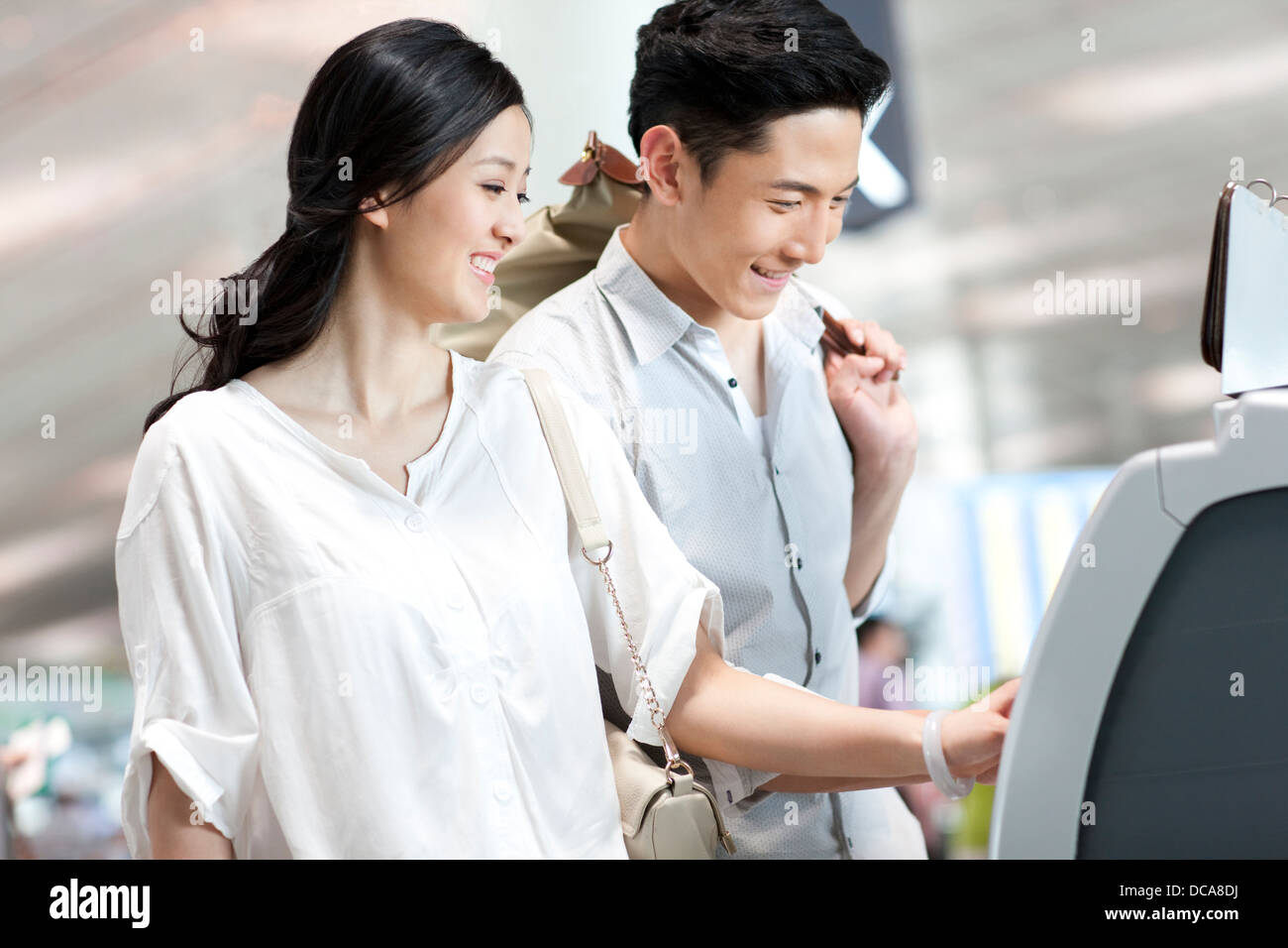 Ticket buying airport hi-res stock photography and images - Alamy