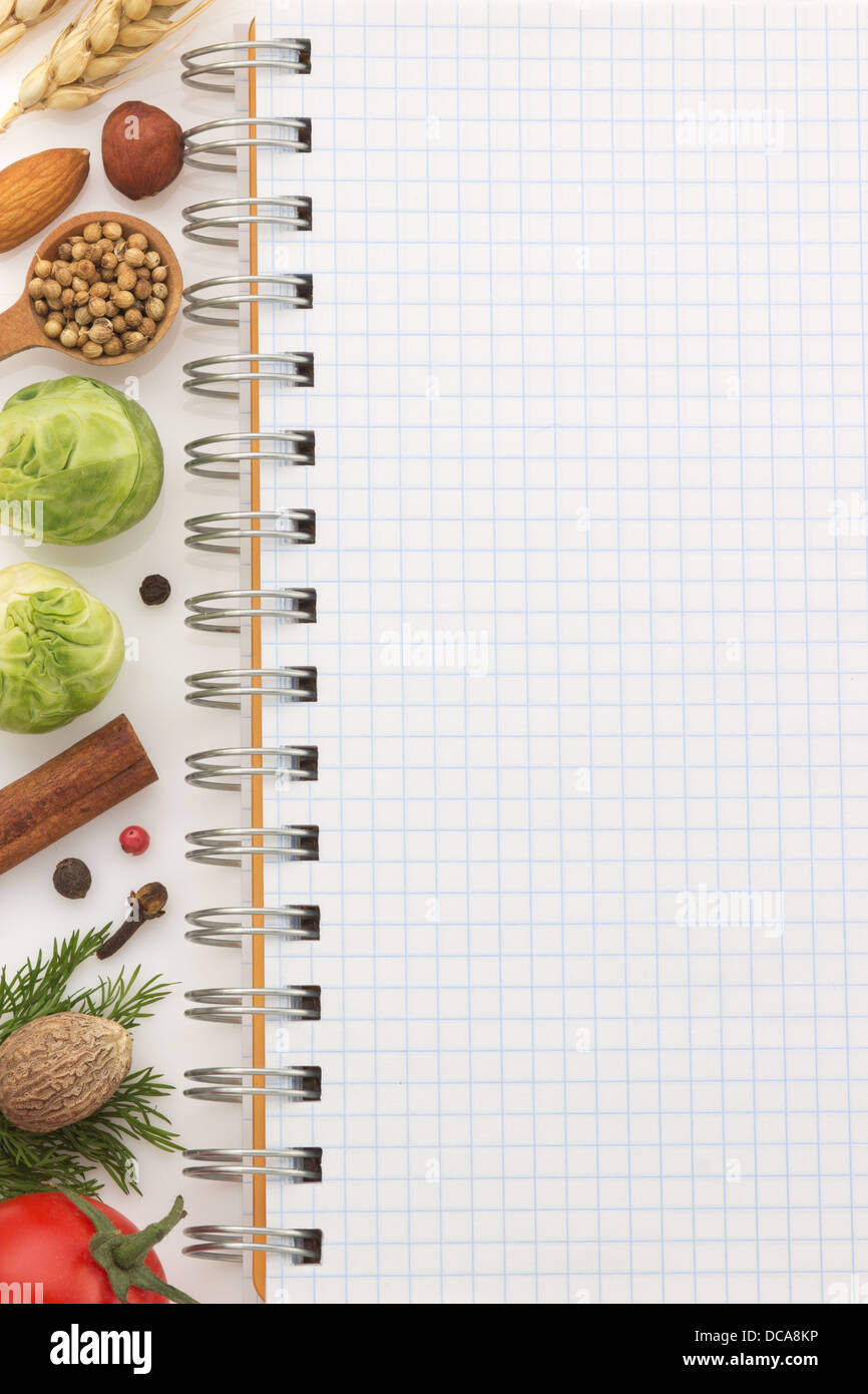 food ingredients and recipe book on white background Stock Photo - Alamy