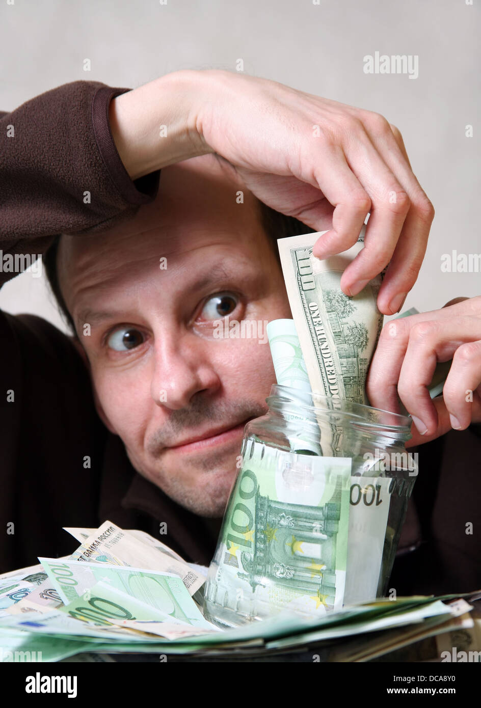 Bank with money Stock Photo - Alamy