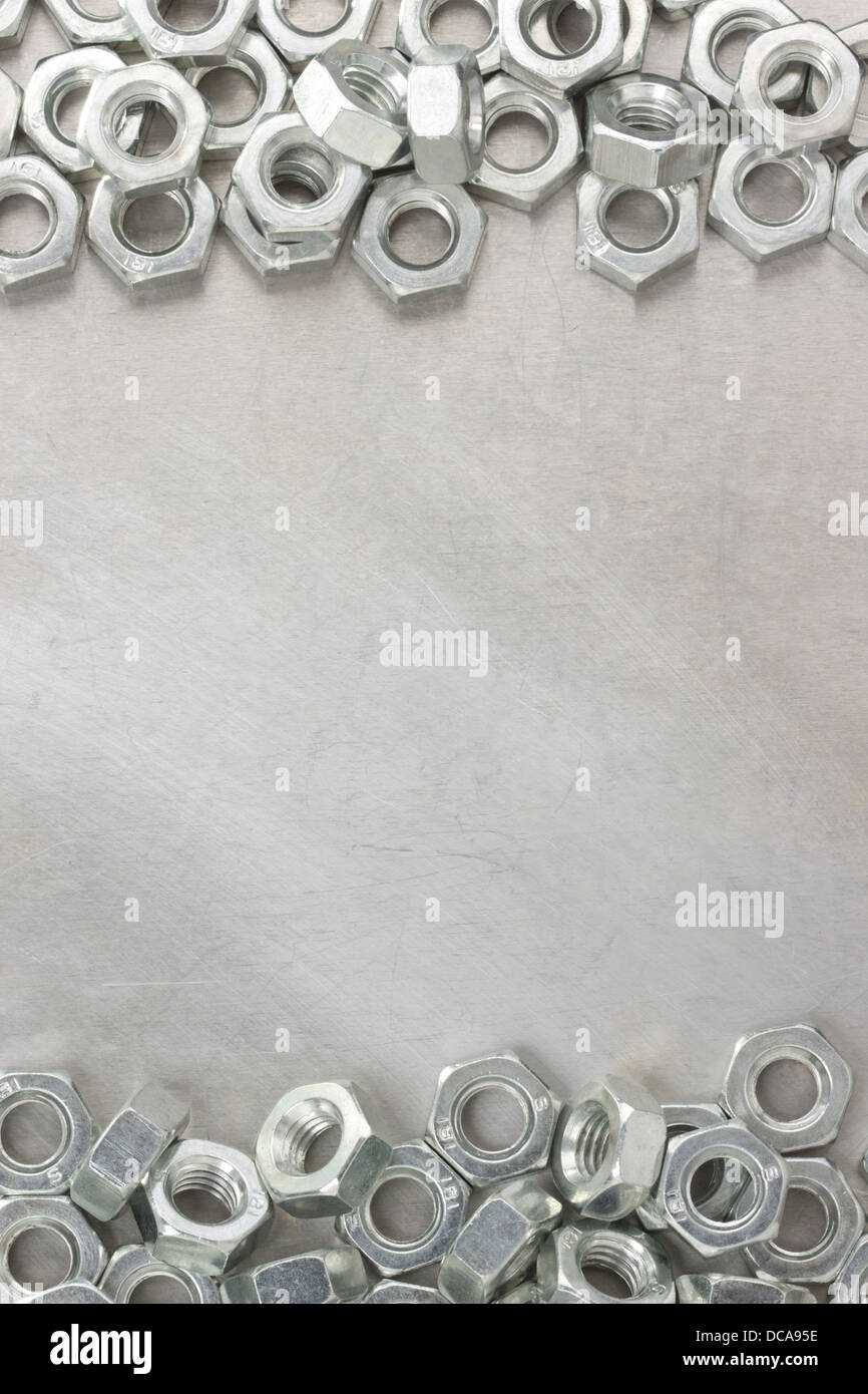 nut tool on metal background texture Stock Photo - Alamy