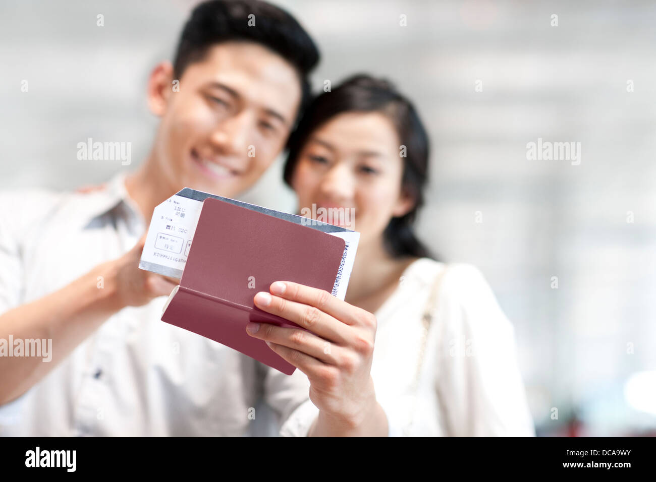 Couple passports airport hi-res stock photography and images - Alamy