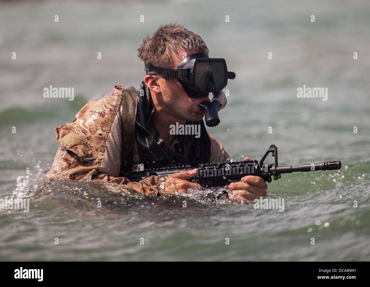 US Marines Maritime Raid Force commandos conduct an amphibious assault ...