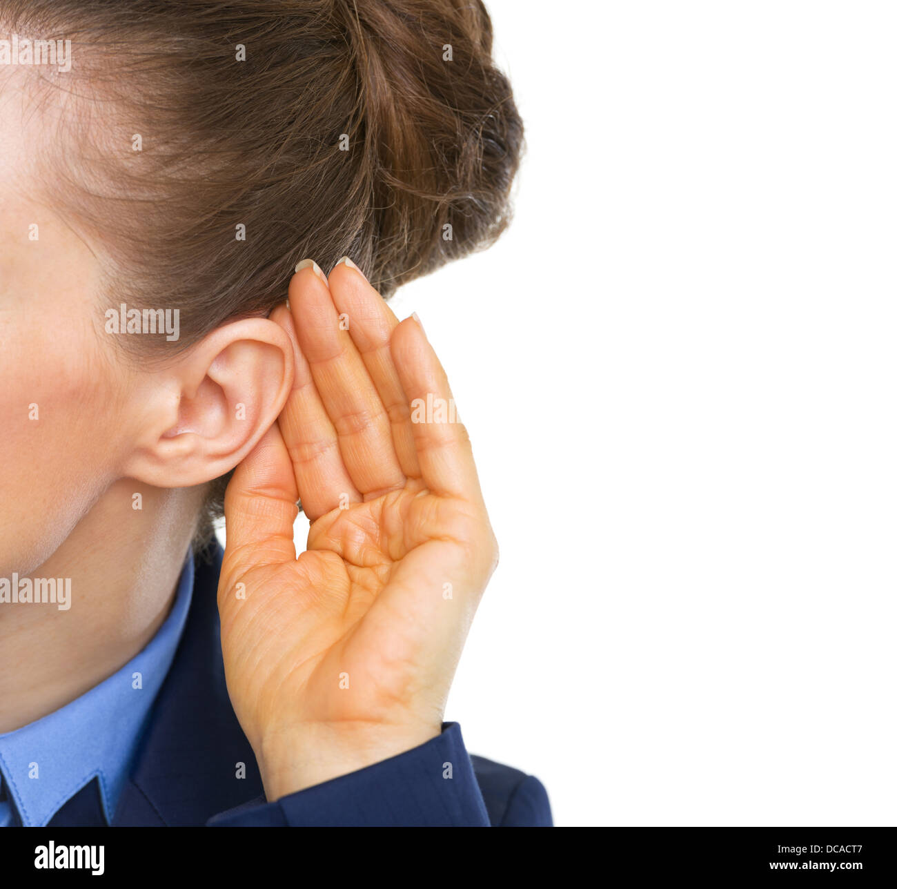 Closeup on business woman listening Stock Photo - Alamy